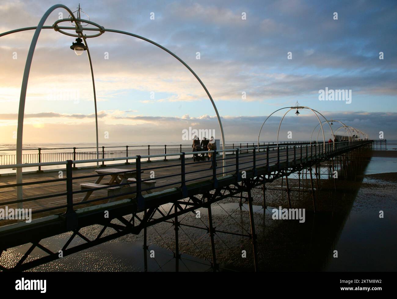 A view along the old Victorian Pier at sunset, Southport, Merseyside ...