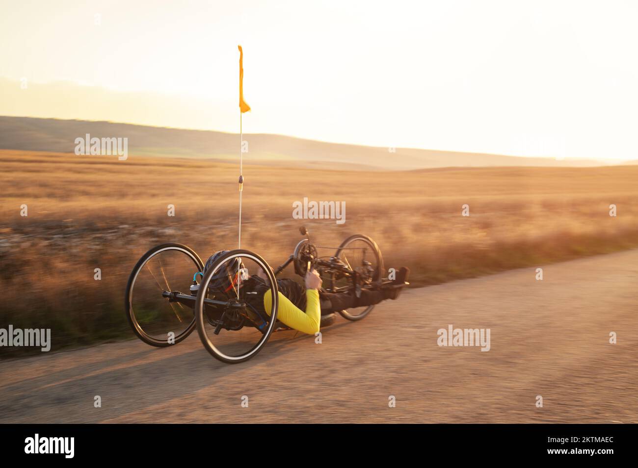 Scenic Shot of a Young Man Athlete with disability Riding a Handcycle ...