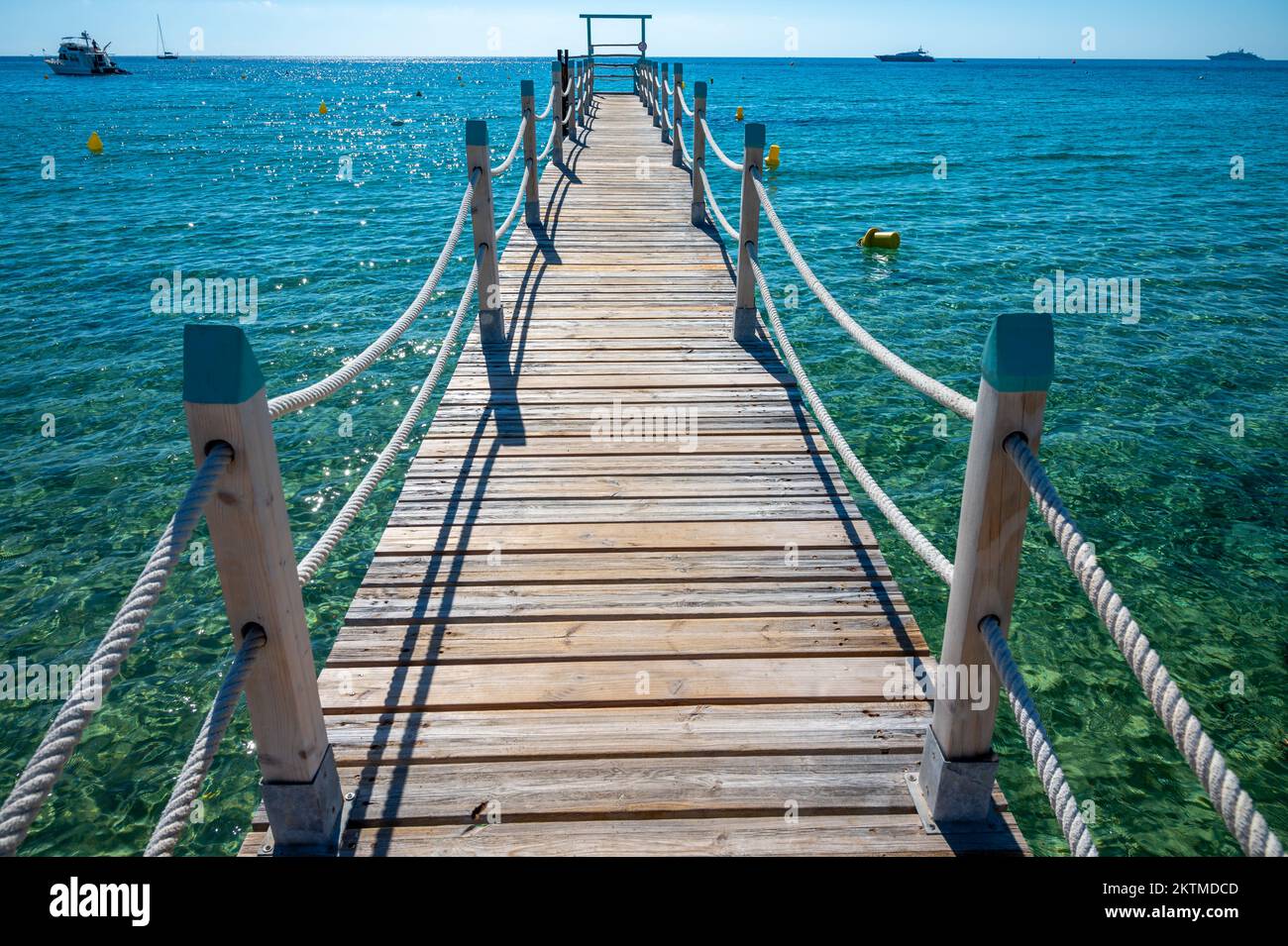 Wooden pier for guests of yachts on legendary Pampelonne beach near ...