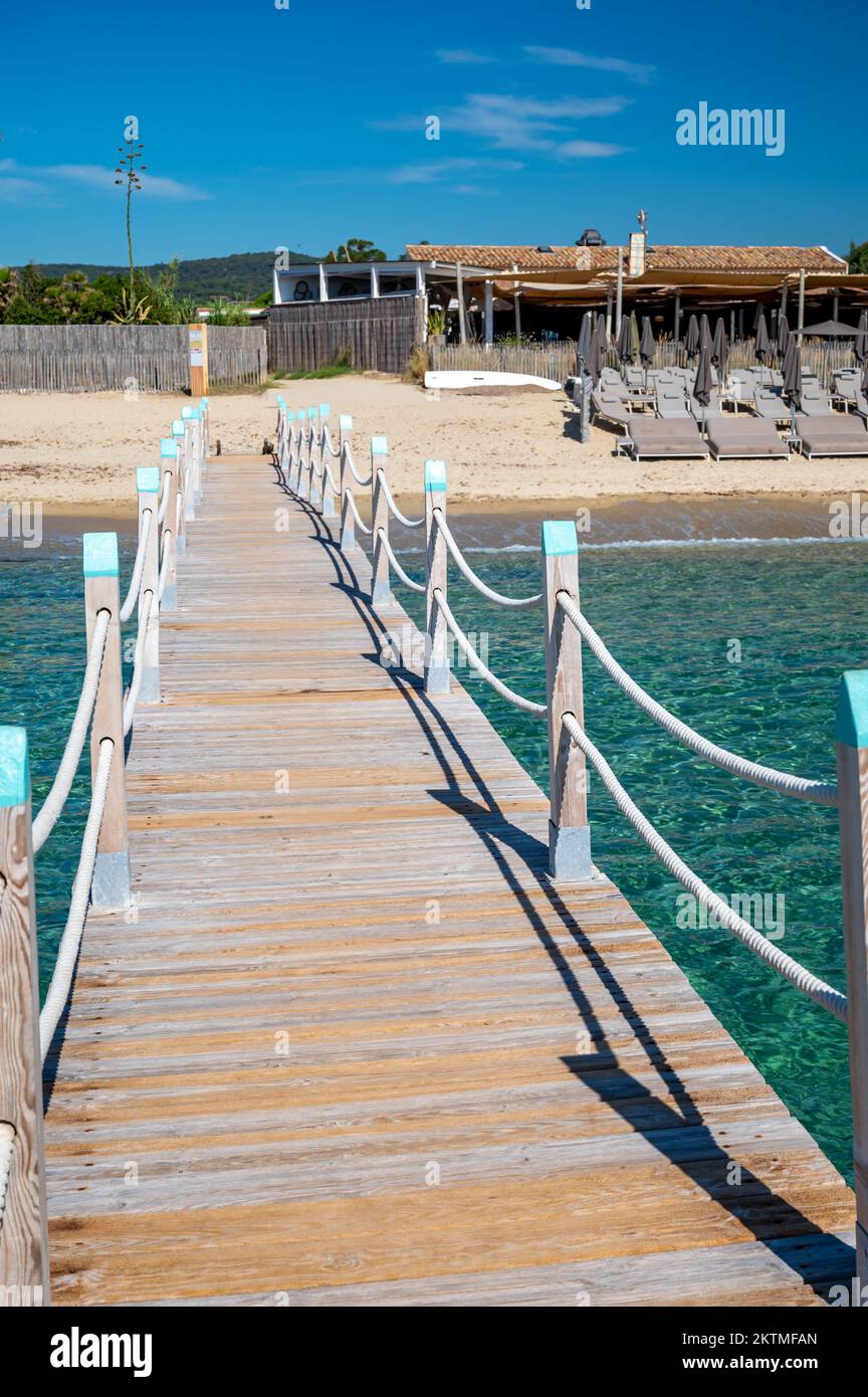 Wooden pier for guests of yachts on legendary Pampelonne beach near ...