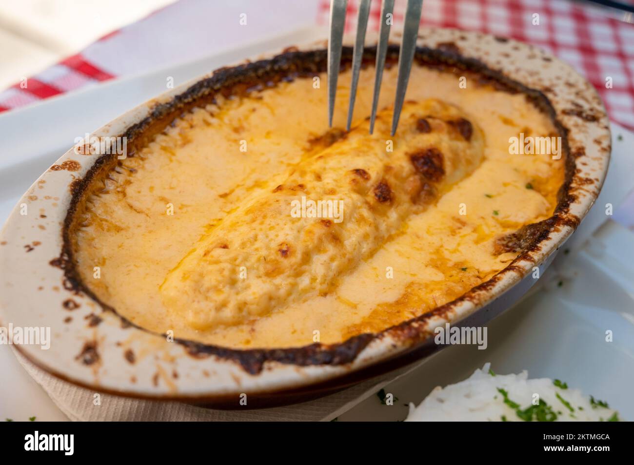 Quenelle, speciality of Lyon, oval-shaped dumplings filled with pike ...