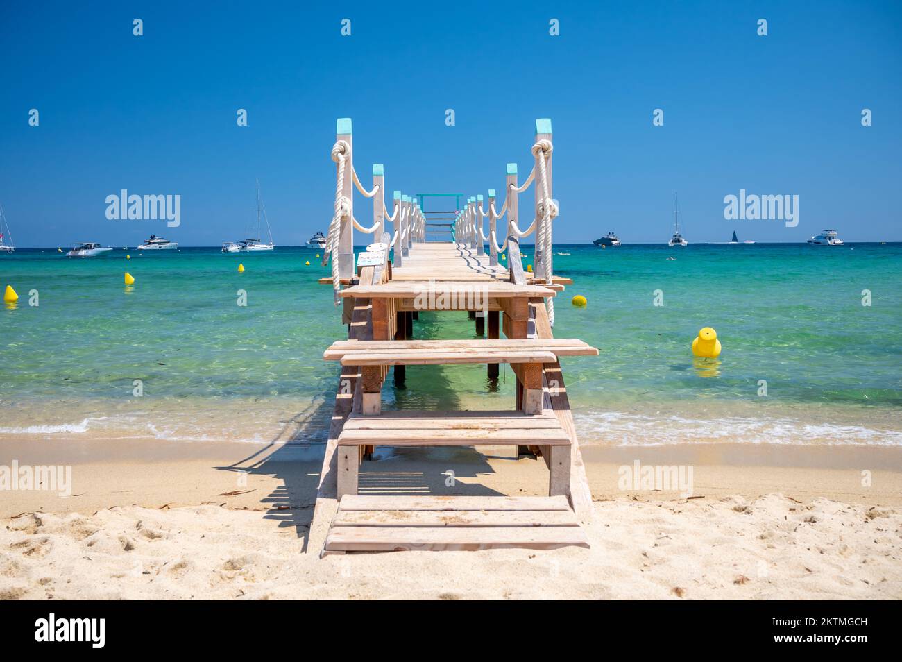 Wooden pier for guests of yachts on legendary Pampelonne beach near ...