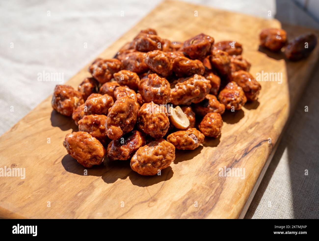 Chouchou french caramelized sweet peanuts with sugar close up Stock ...