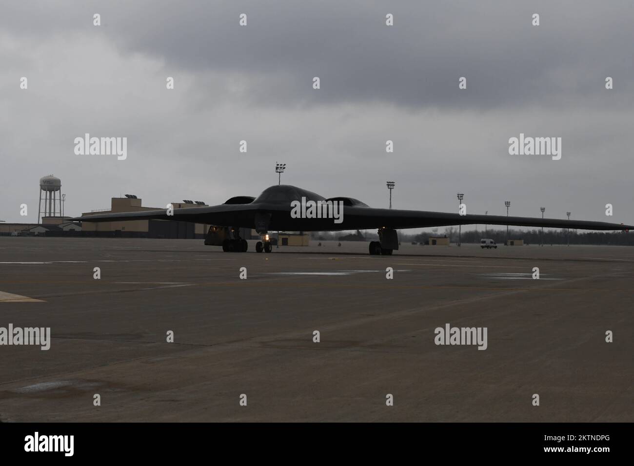 A B-2 Spirit stealth bomber taxis down the flight line to the runway ...