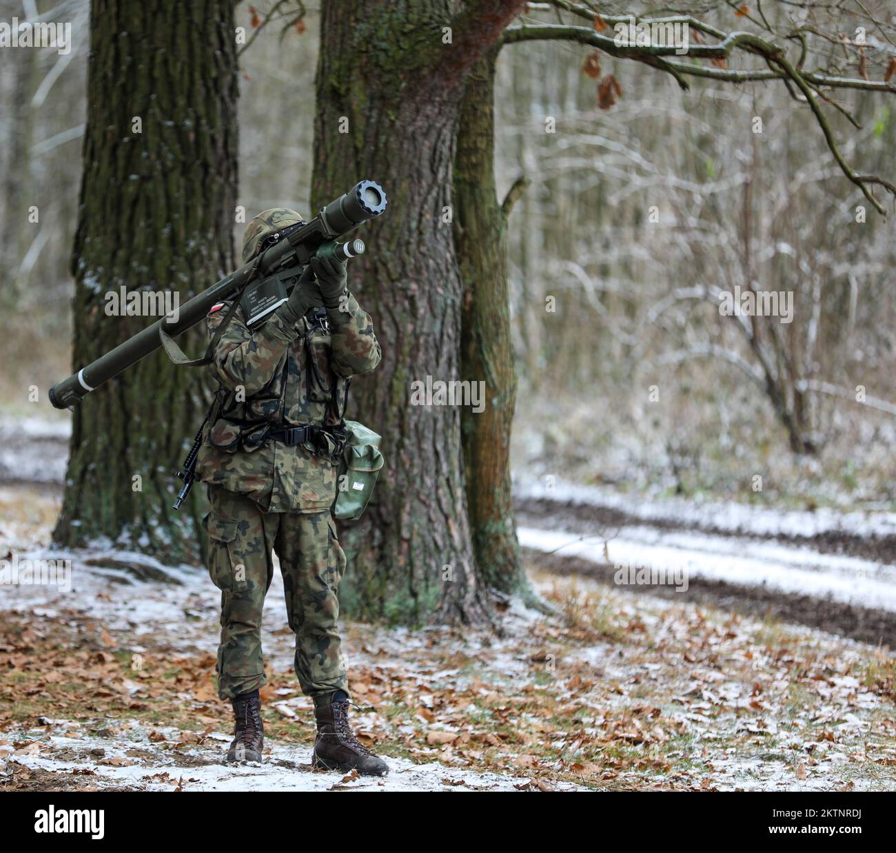 A Polish soldier assigned to 20th Mechanized Brigade provides security ...