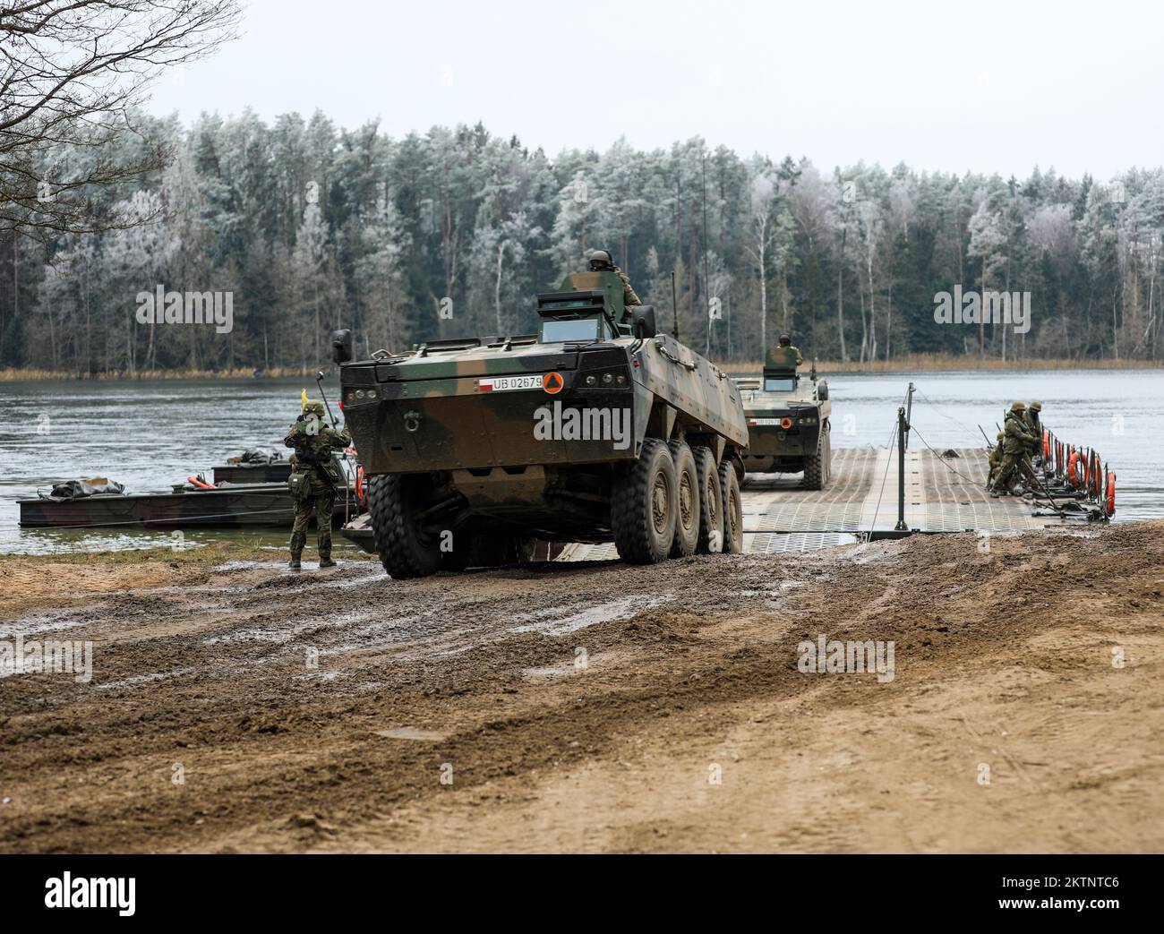 Polish soldiers assigned to 20th Mechanized Brigade utilize a floating ...