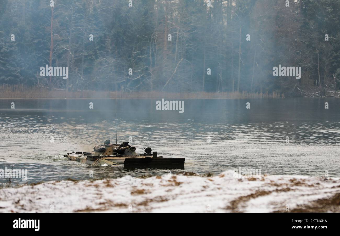 Polish soldiers assigned to 20th Mechanized Brigade operating a BMP-1 ...