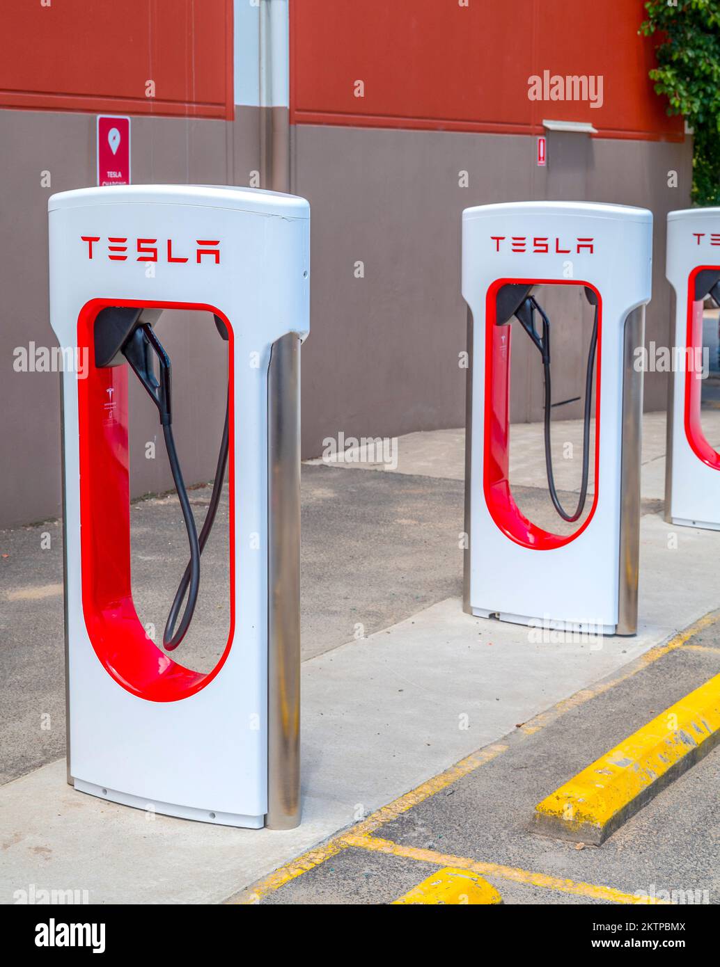 Tesla charging points at Coles car park in Tenterfield Stock Photo - Alamy