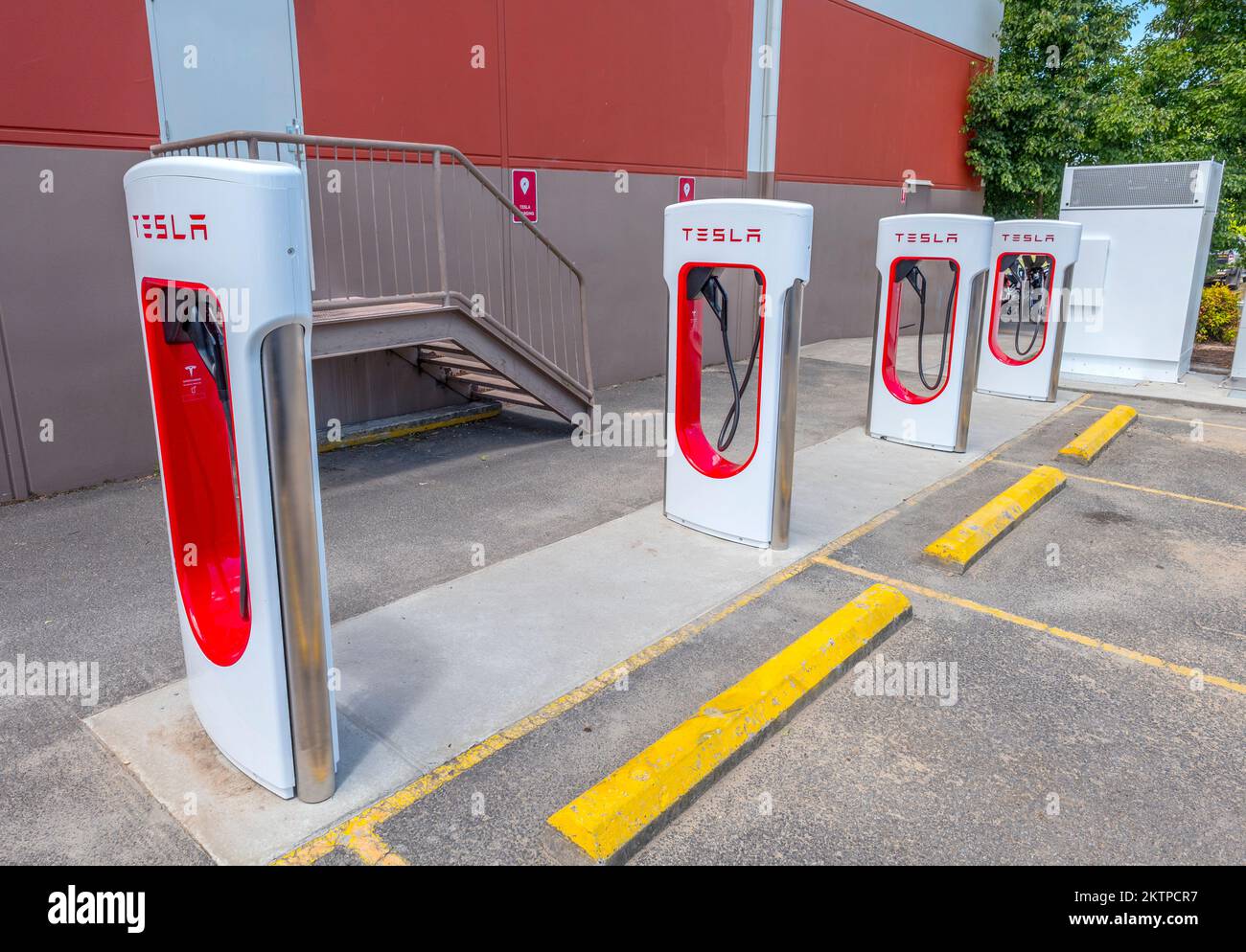 Tesla charging points at Coles car park in Tenterfield Stock Photo - Alamy