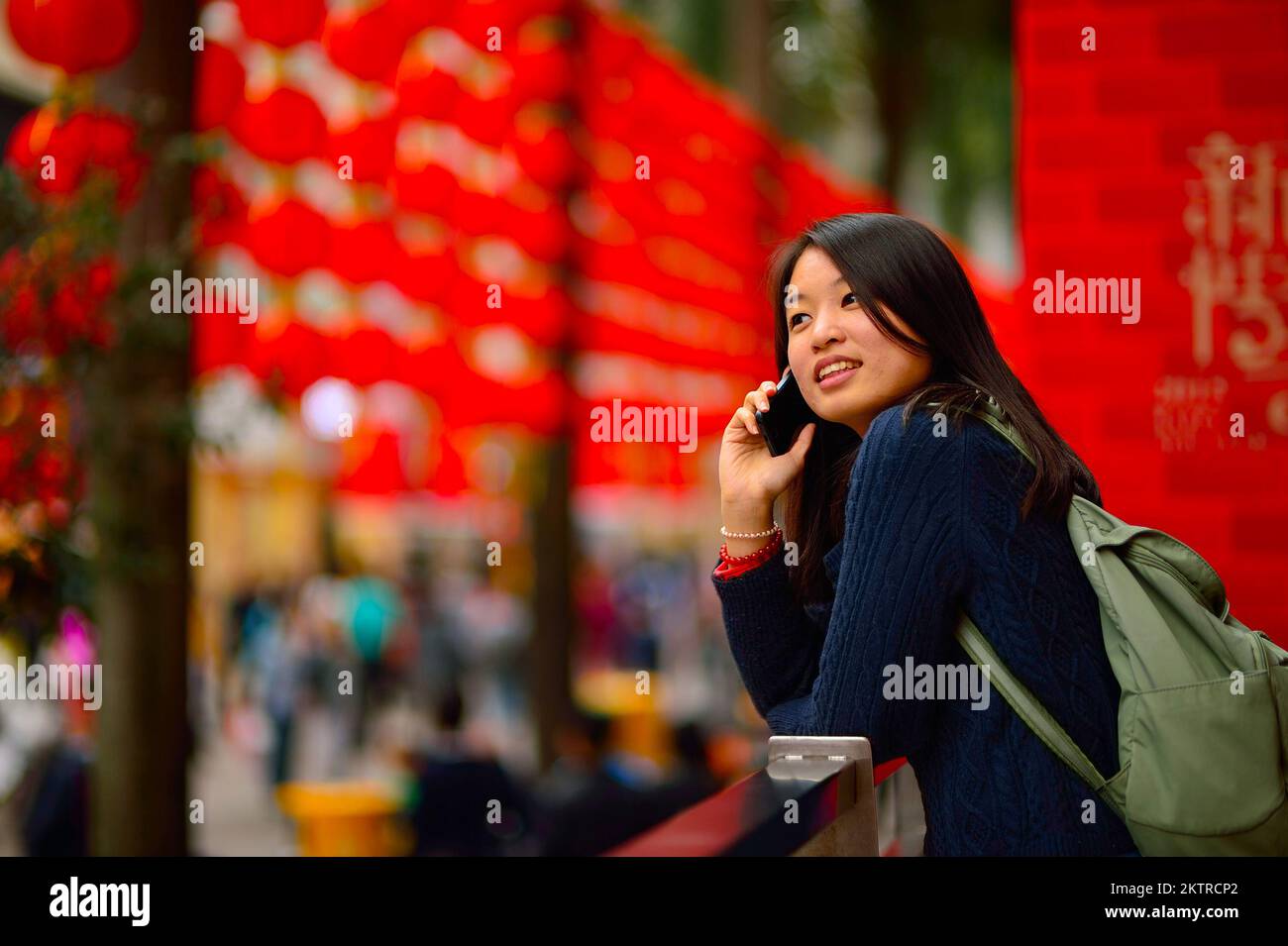 Chinese woman talking on cell phone during chinese new year Stock Photo ...