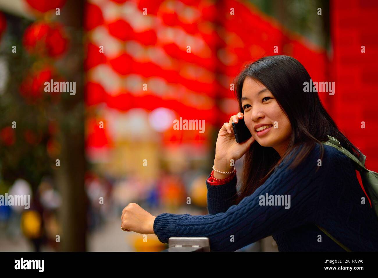 Chinese woman talking on cell phone during chinese new year Stock Photo ...