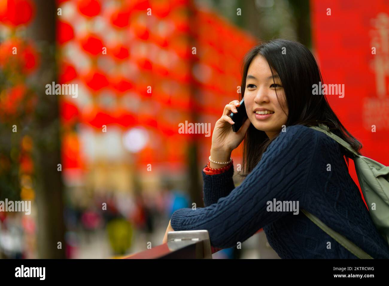 Chinese woman talking on cell phone during chinese new year Stock Photo ...
