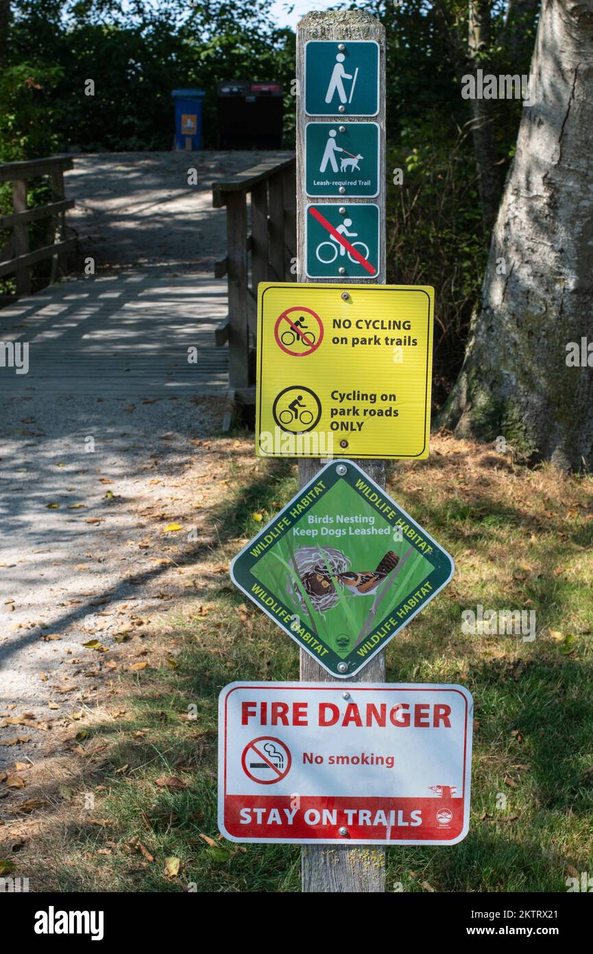 Hiking trail signs at Deas Island Regional Park in Delta, British ...