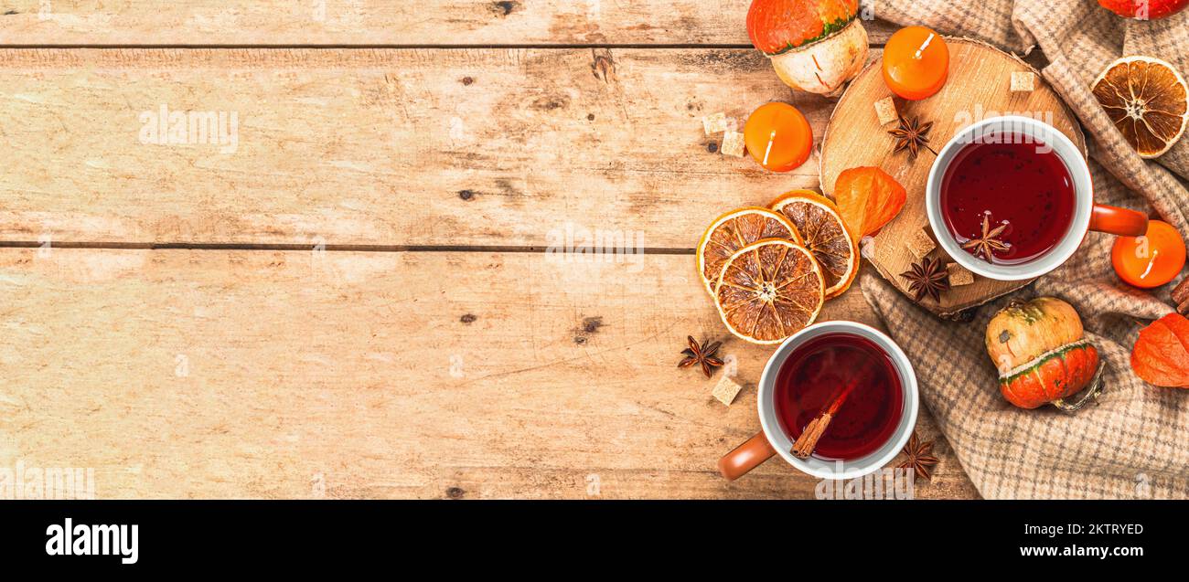 Spicy hot tea. Autumn good mood, traditional fall beverage in cups ...