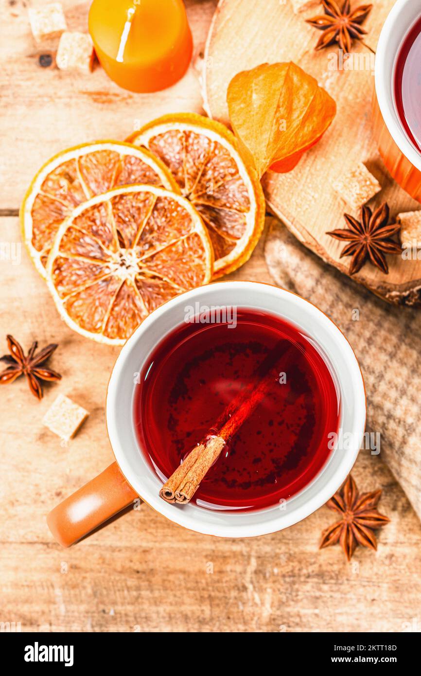 Spicy hot tea. Autumn good mood, traditional fall beverage in cups ...