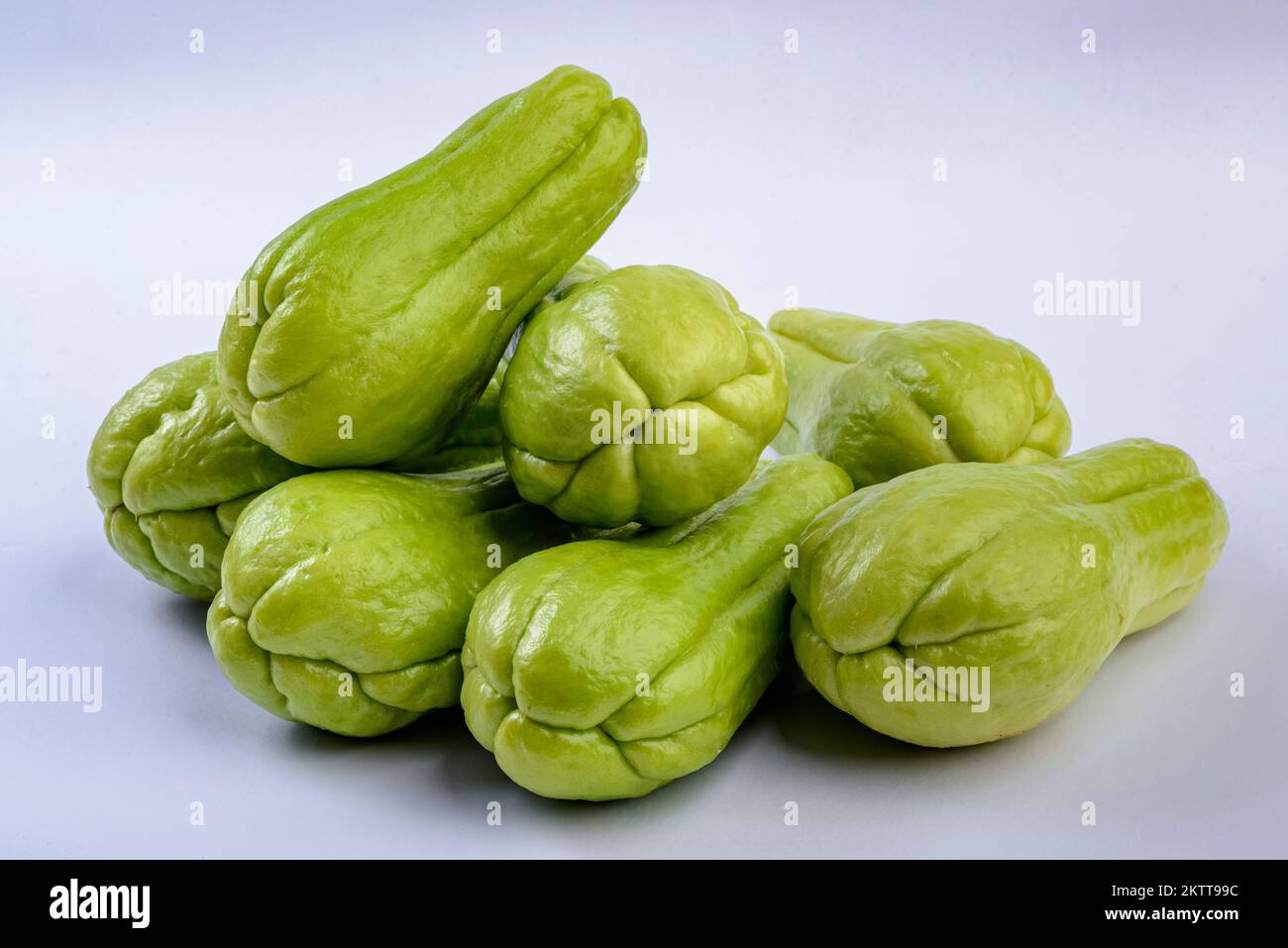 Chayotes isolated on white background Stock Photo - Alamy