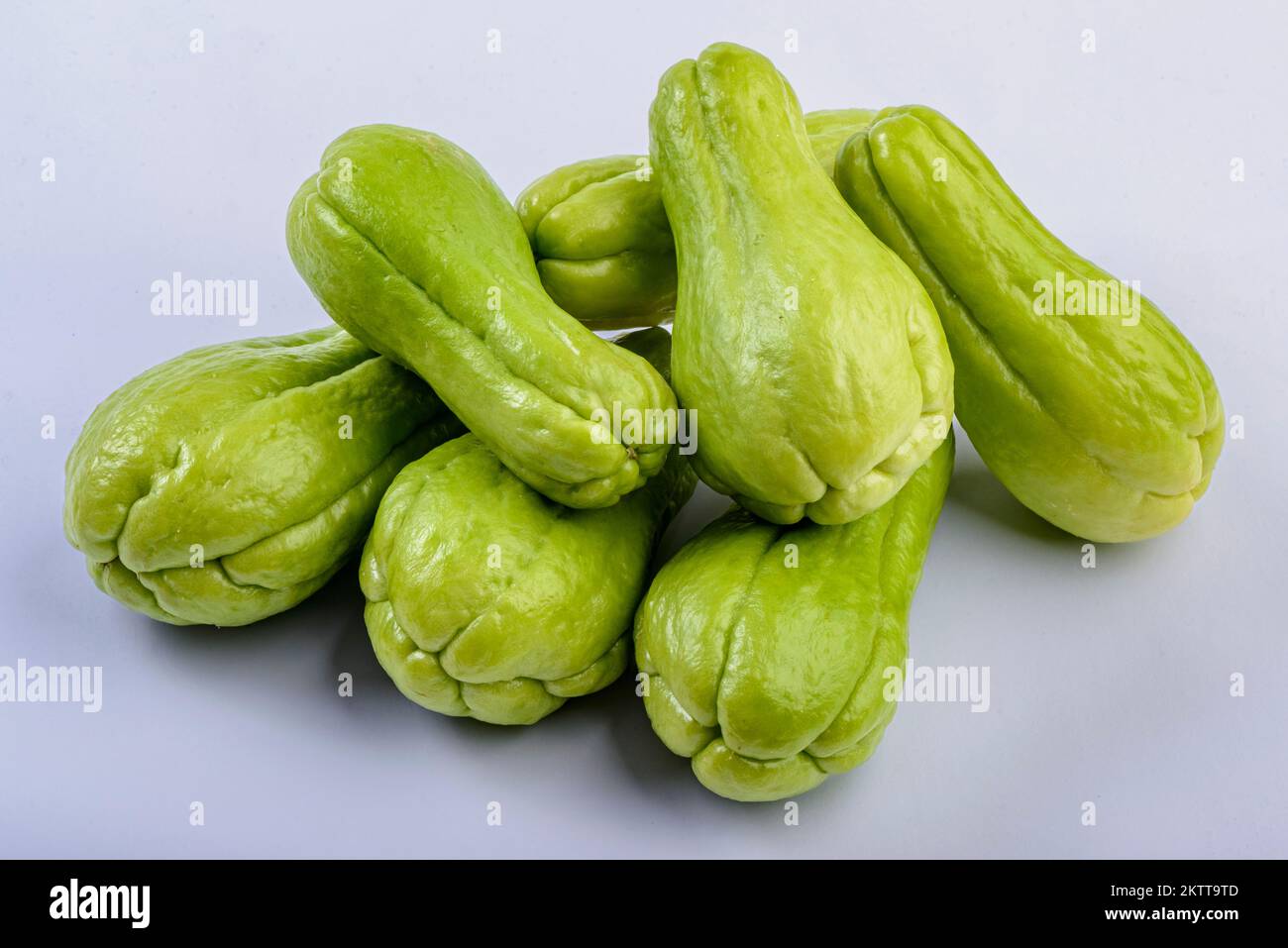Chayotes isolated on white background Stock Photo - Alamy