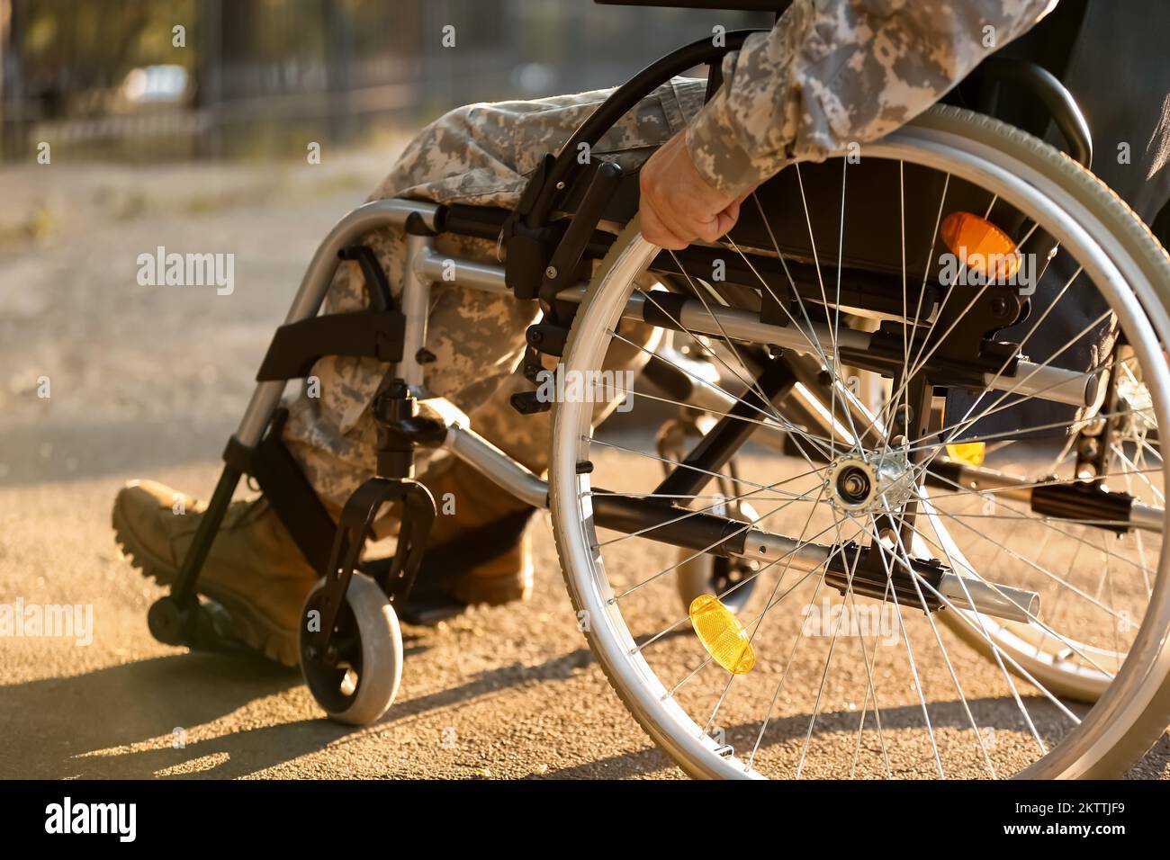 Young soldier in wheelchair outdoors, closeup Stock Photo - Alamy