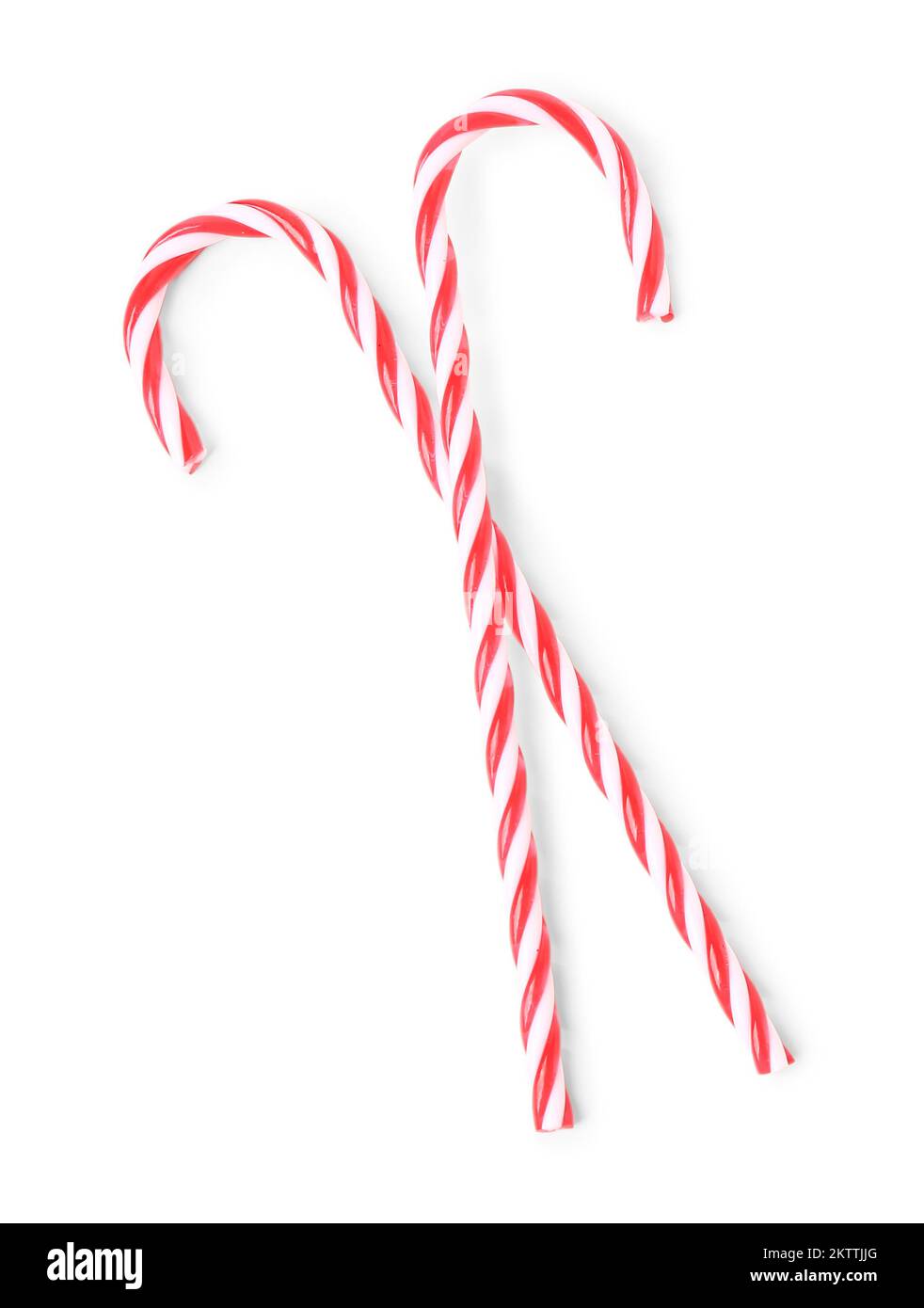 Sweet candy canes on white background Stock Photo - Alamy