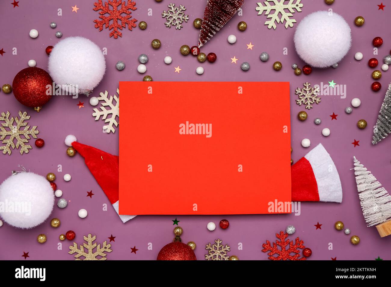 Composition with blank card and different Christmas decorations on ...