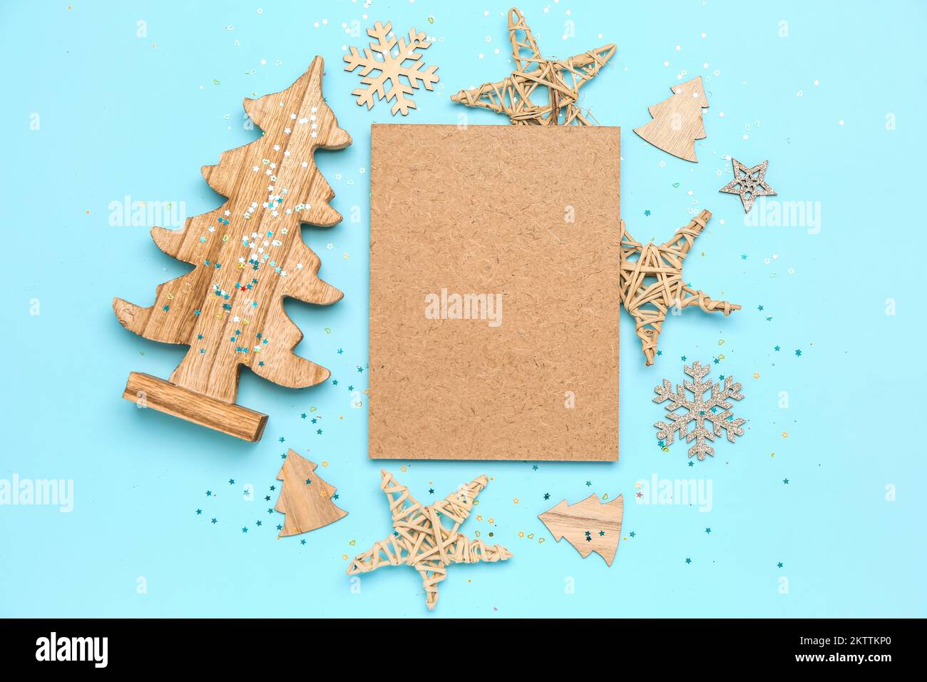 Composition with blank card and Christmas decorations on color ...