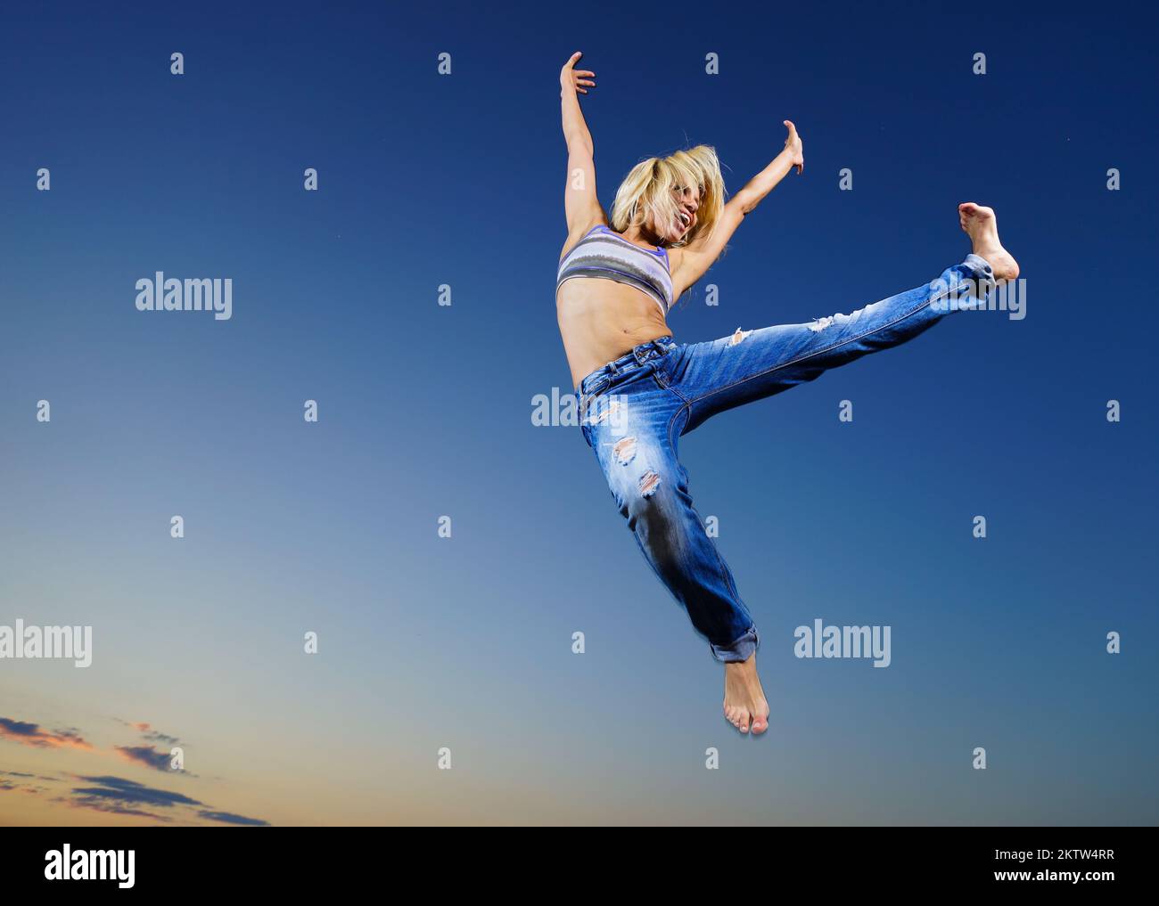 Professional gymnast woman at night Stock Photo - Alamy