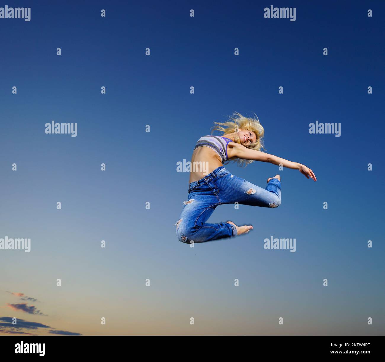 Professional gymnast woman at night Stock Photo - Alamy