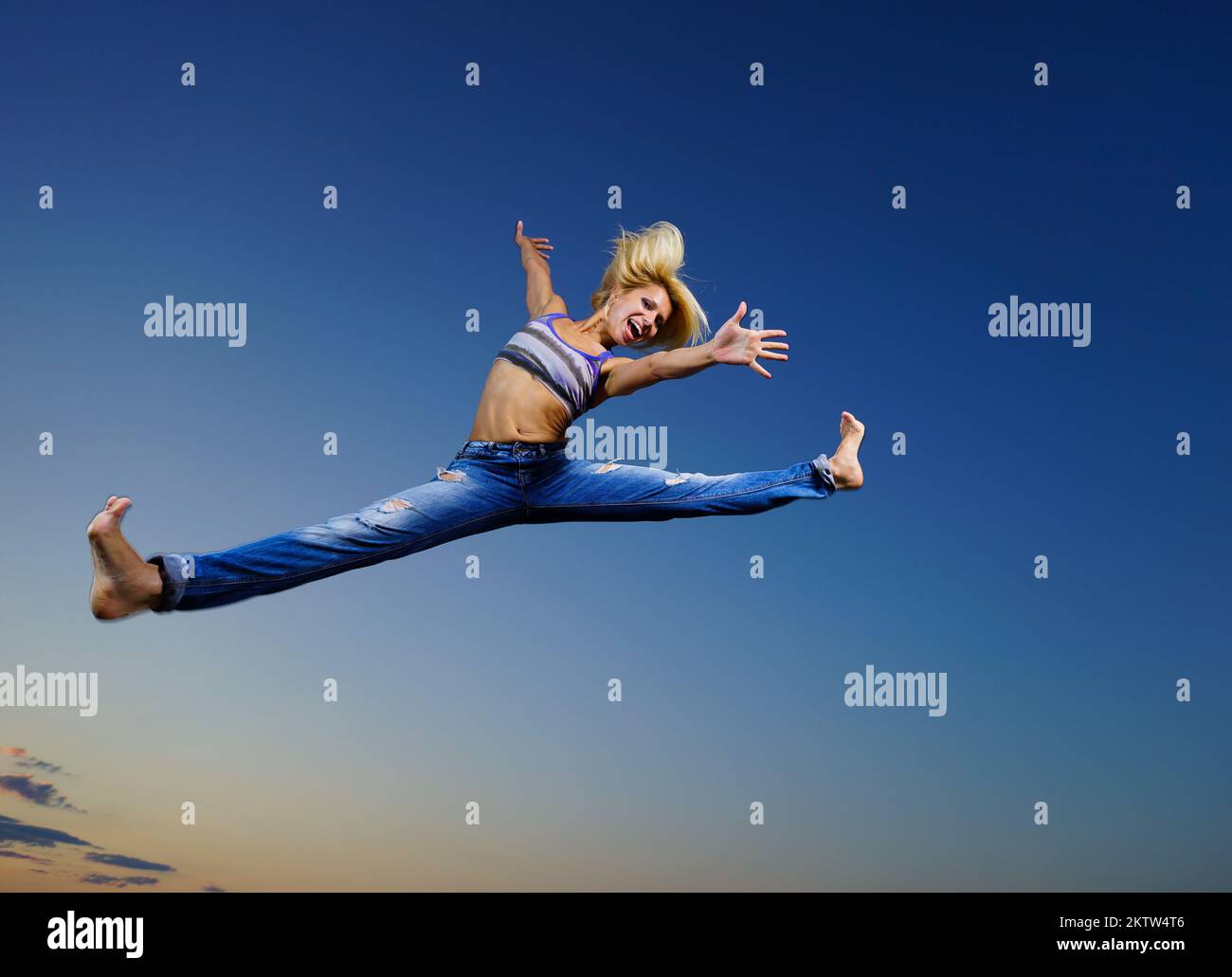 Professional gymnast woman at night Stock Photo - Alamy