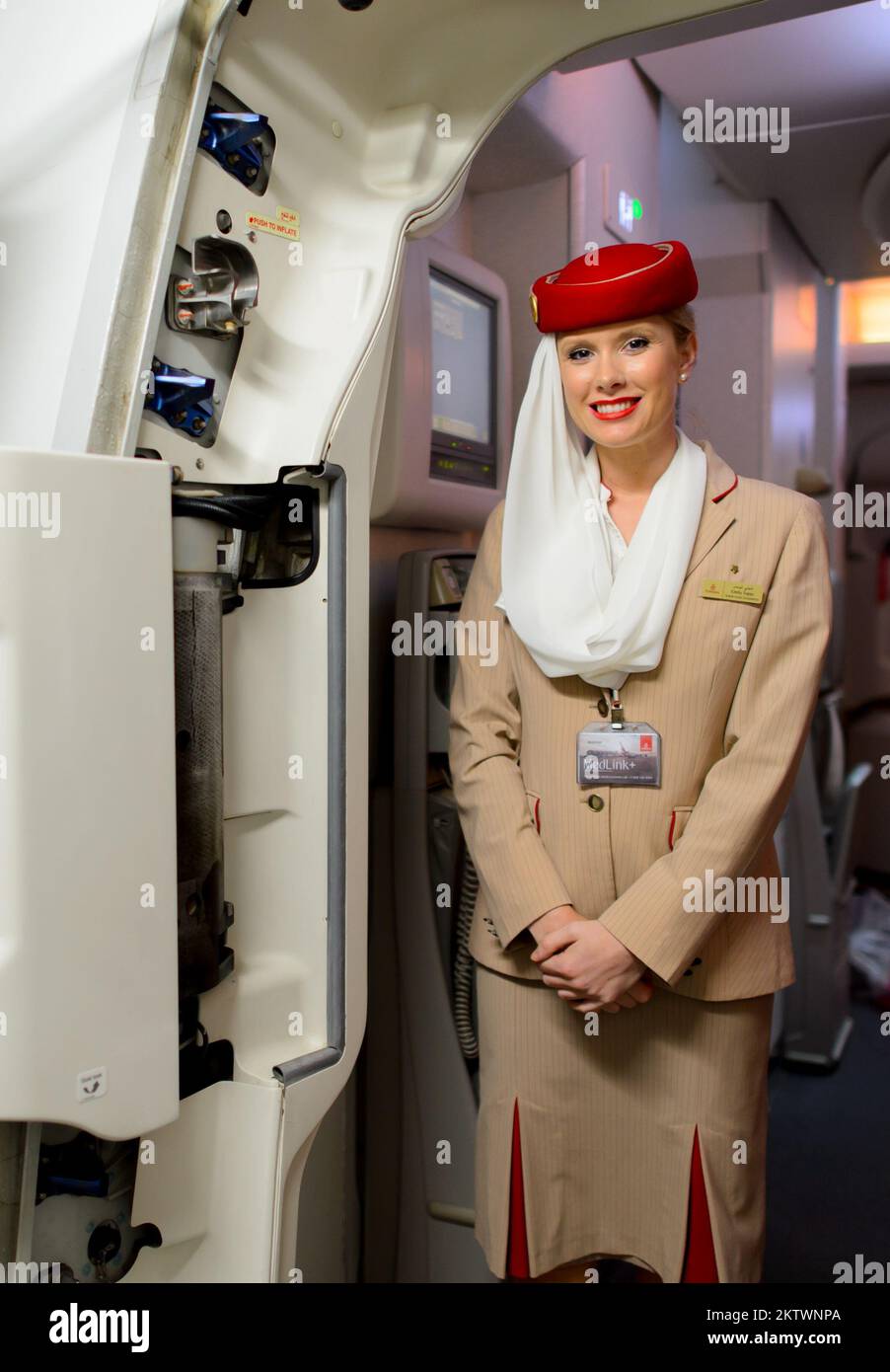 HONGKONG, CHINA - DECEMBER 10, 2014: Emirates Airbus A380 crew member ...