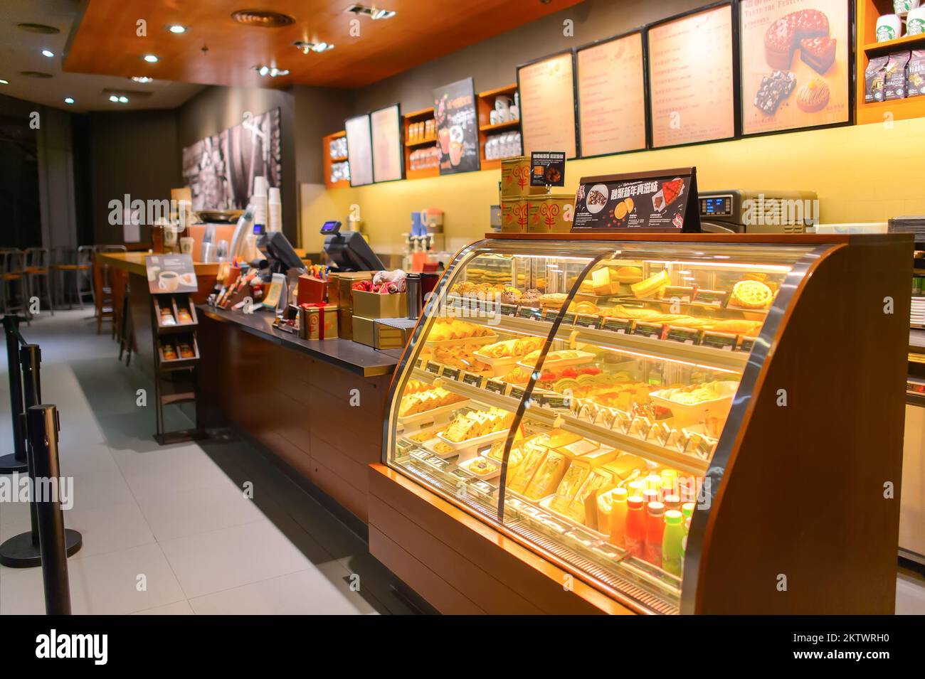SHENZHEN, CHINA - JANUARY 31, 2015: Starbucks Cafe interior at night ...