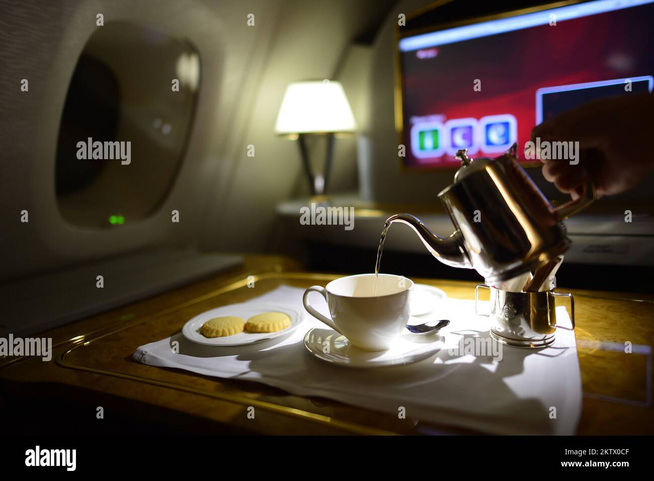 DUBAI, UAE - MARCH 31, 2015: Emirates first class interior. Emirates is ...