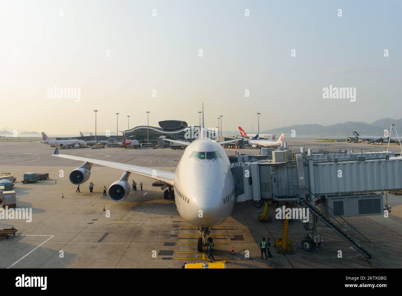HONG KONG - APRIL 17: jet aircraft docked in airport on April 17, 2014 ...