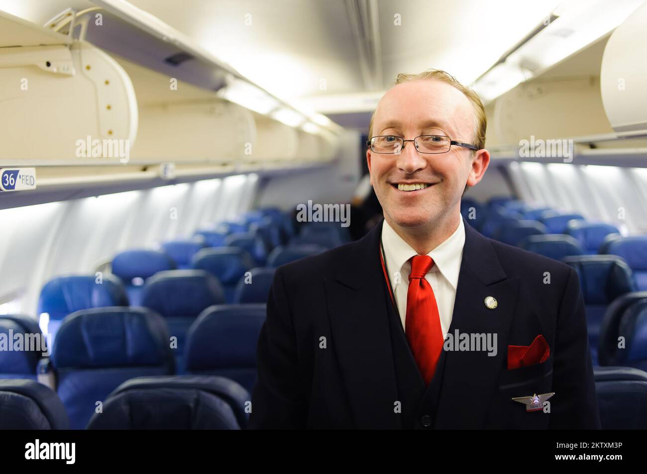 NEW-YORK, USA - APRIL 19, 2011: Delta Air Lines crew member in Boeing ...