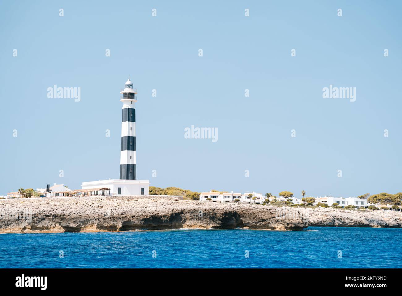 Beautiful blue white lighthouse on the Spanish island of Menorca Stock Photo - Alamy