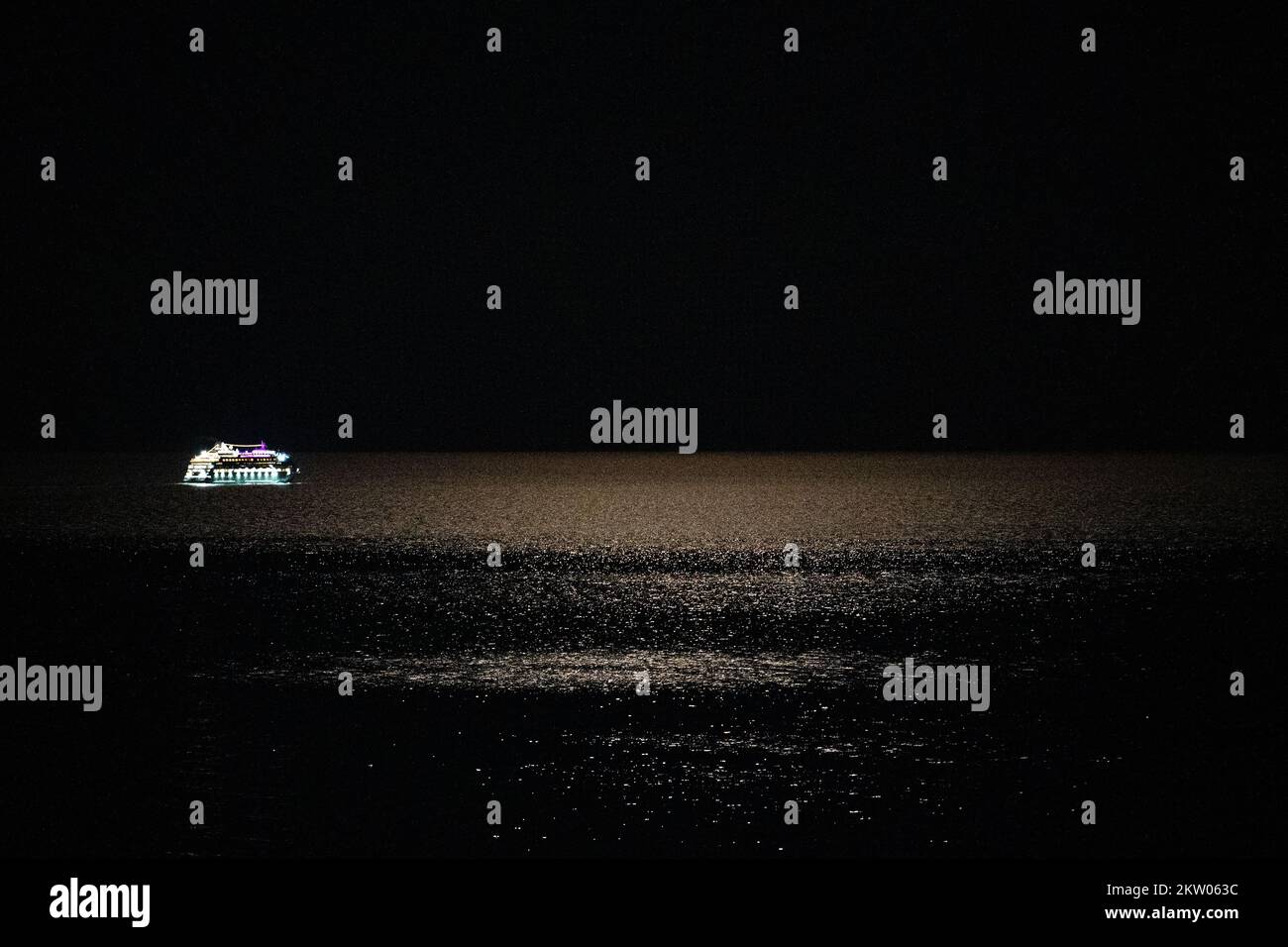 The ship goes to sea on a summer night in the rays of the full moon ...