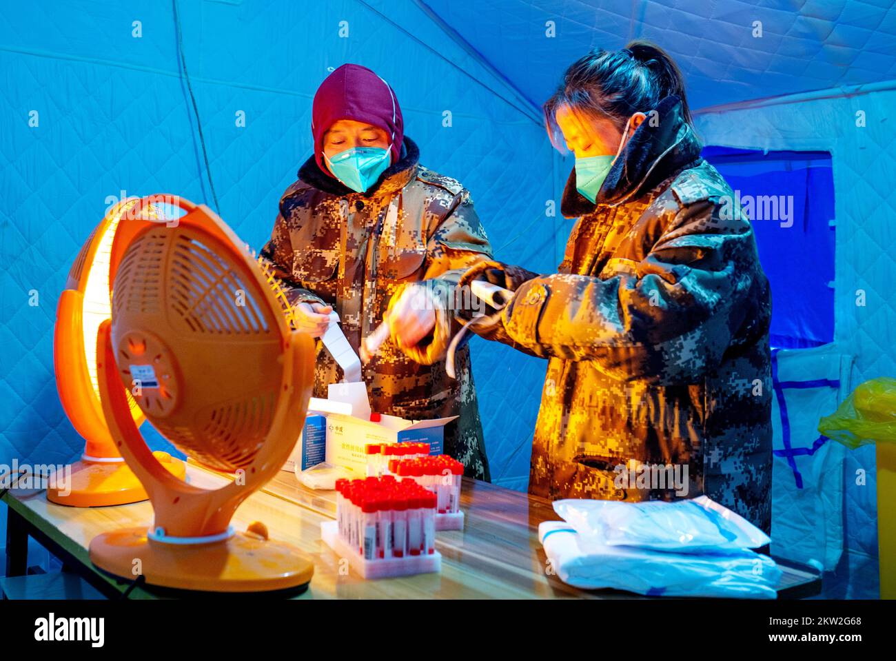 HOHHOT, CHINA - NOVEMBER 30, 2022 - Volunteers paste test tube codes at ...