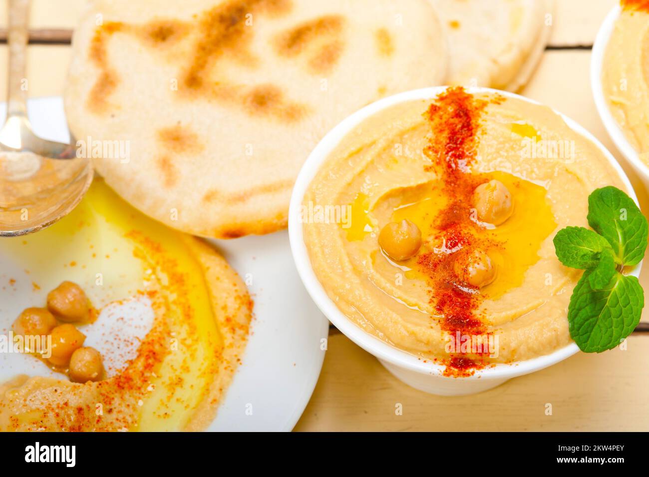 Traditional chickpeas Hummus with pita bread and paprika on top Stock ...