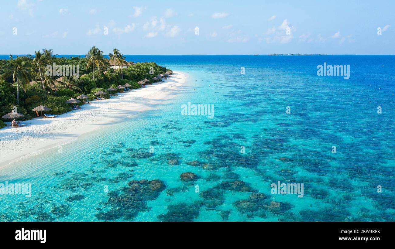 Aerial view bird's eye view of left long beach palm beach of Maldives ...