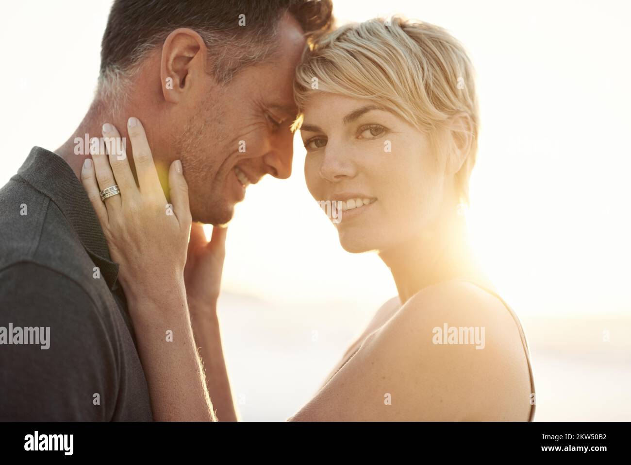 Our love will last a lifetime...Closeup of a woman holding her husband ...