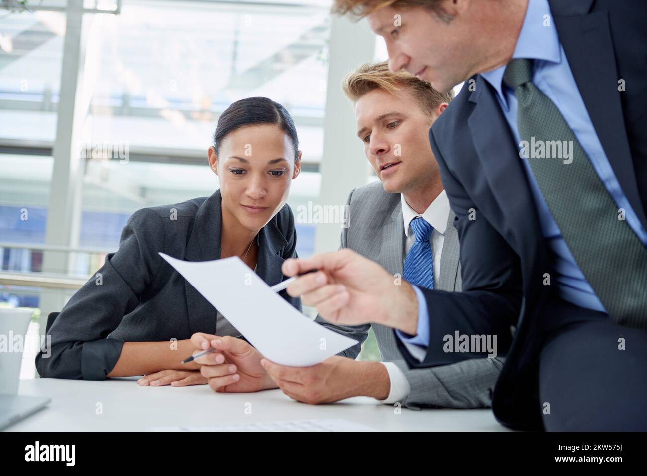 Successful woman discussing documents attractive hi-res stock ...
