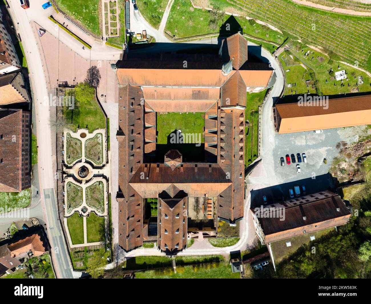 Aerial view of Bronnbach Monastery with castle gardens and church ...
