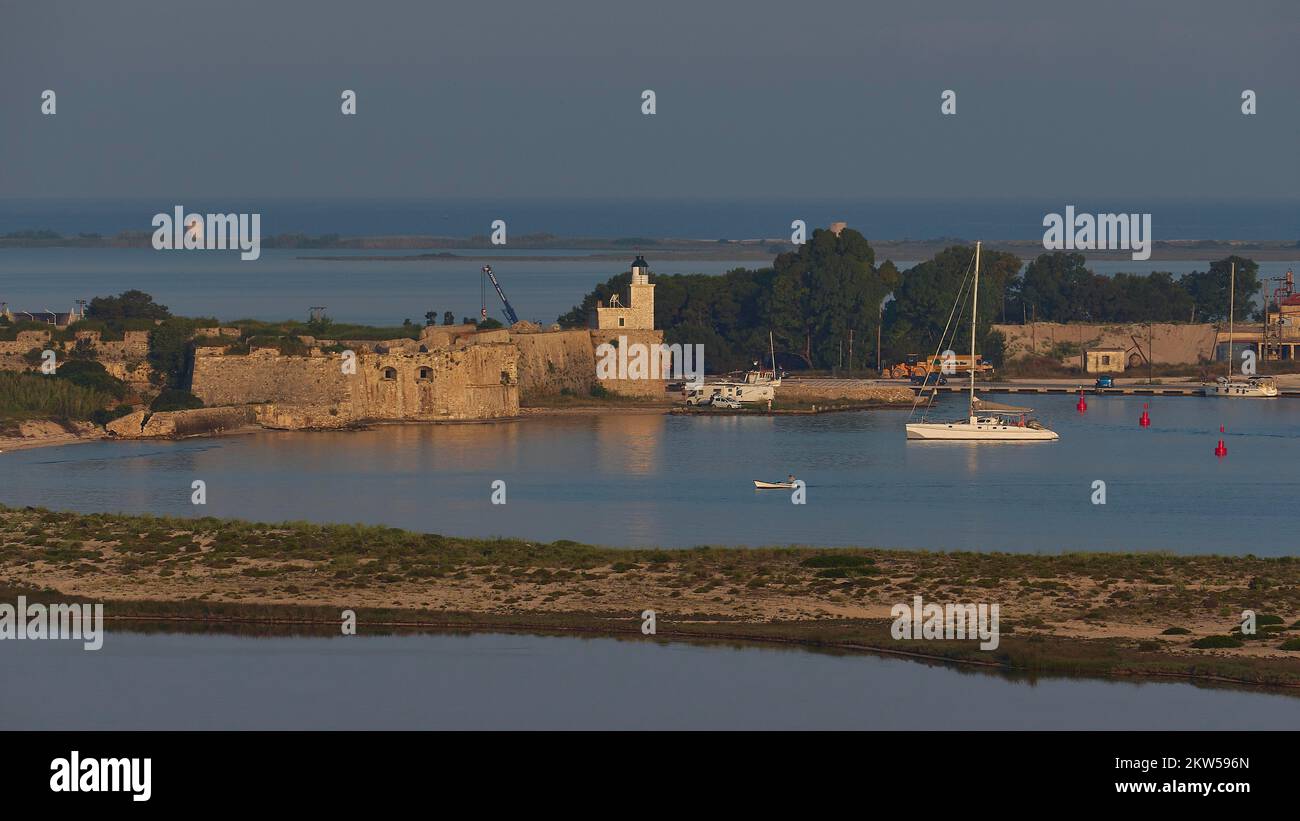 Santa Maura sea fortress, sailboat, morning light, blue cloudless sky ...