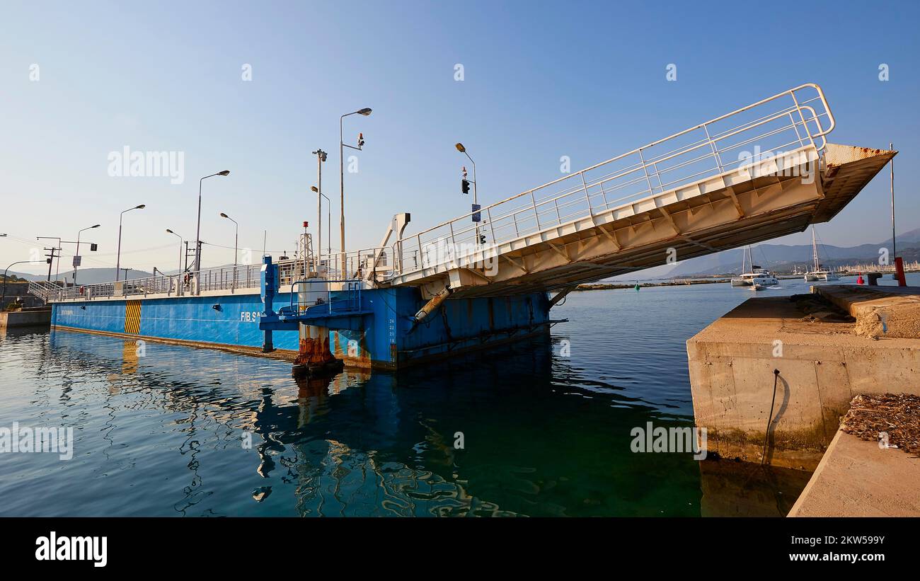 Little open swing bridge, Santa Maura ferry bridge, blue cloudless sky ...