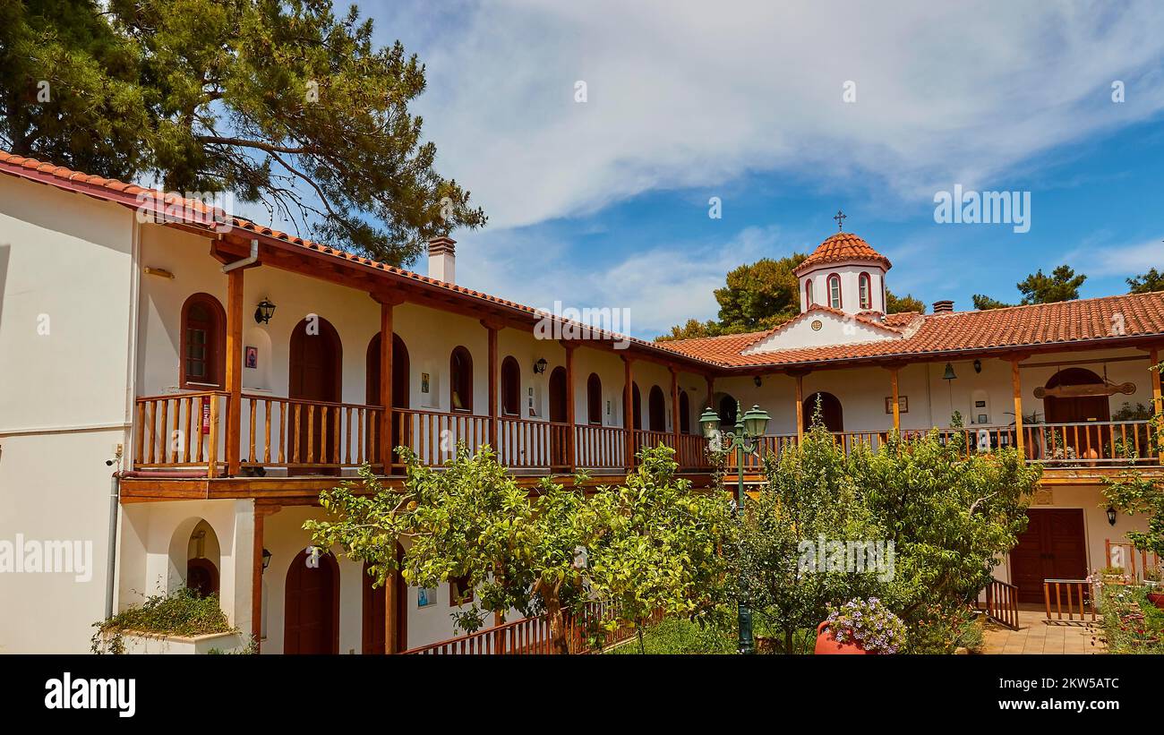 Faneromeni Monastery, courtyard, red tiled roofs, hexagonal church ...
