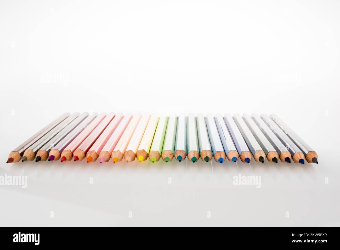 Color pencils of various color on a white background Stock Photo - Alamy