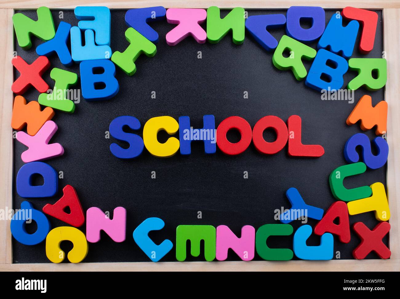 Colorful Letters of Alphabet made of wood and school wording Stock ...