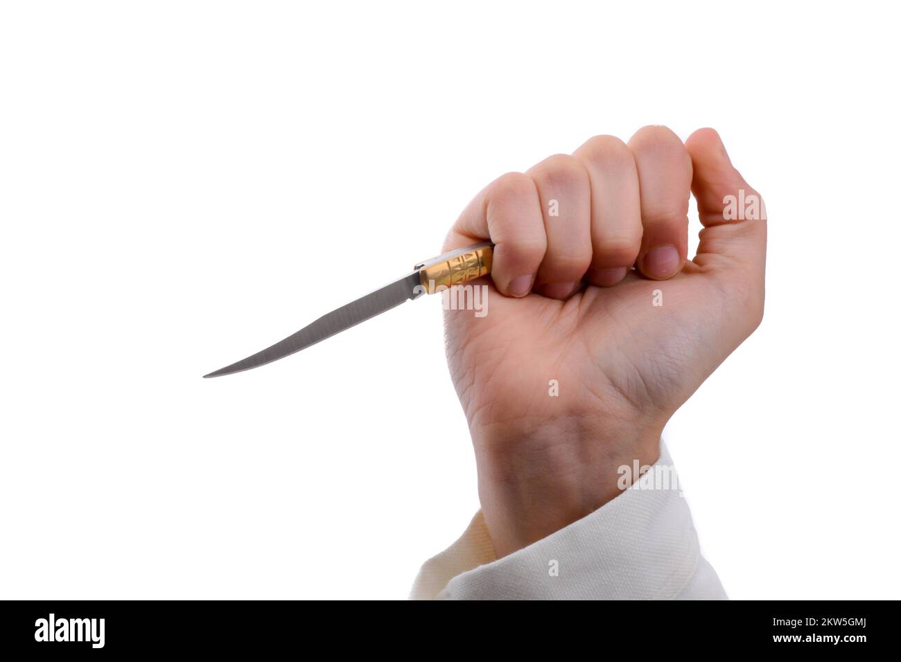 Hand holding a knife in hand on a white background Stock Photo - Alamy