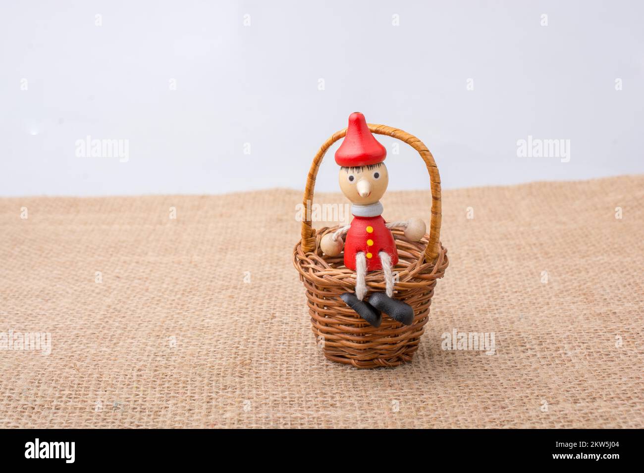 Pinocchio sitting hi-res stock photography and images - Alamy