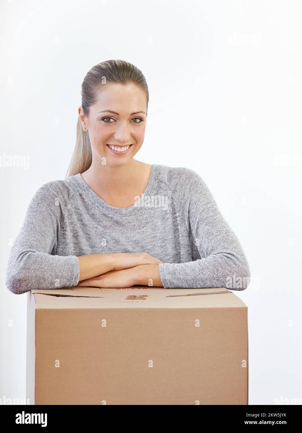 Moving on to better things. An attractive young woman leaning against a ...