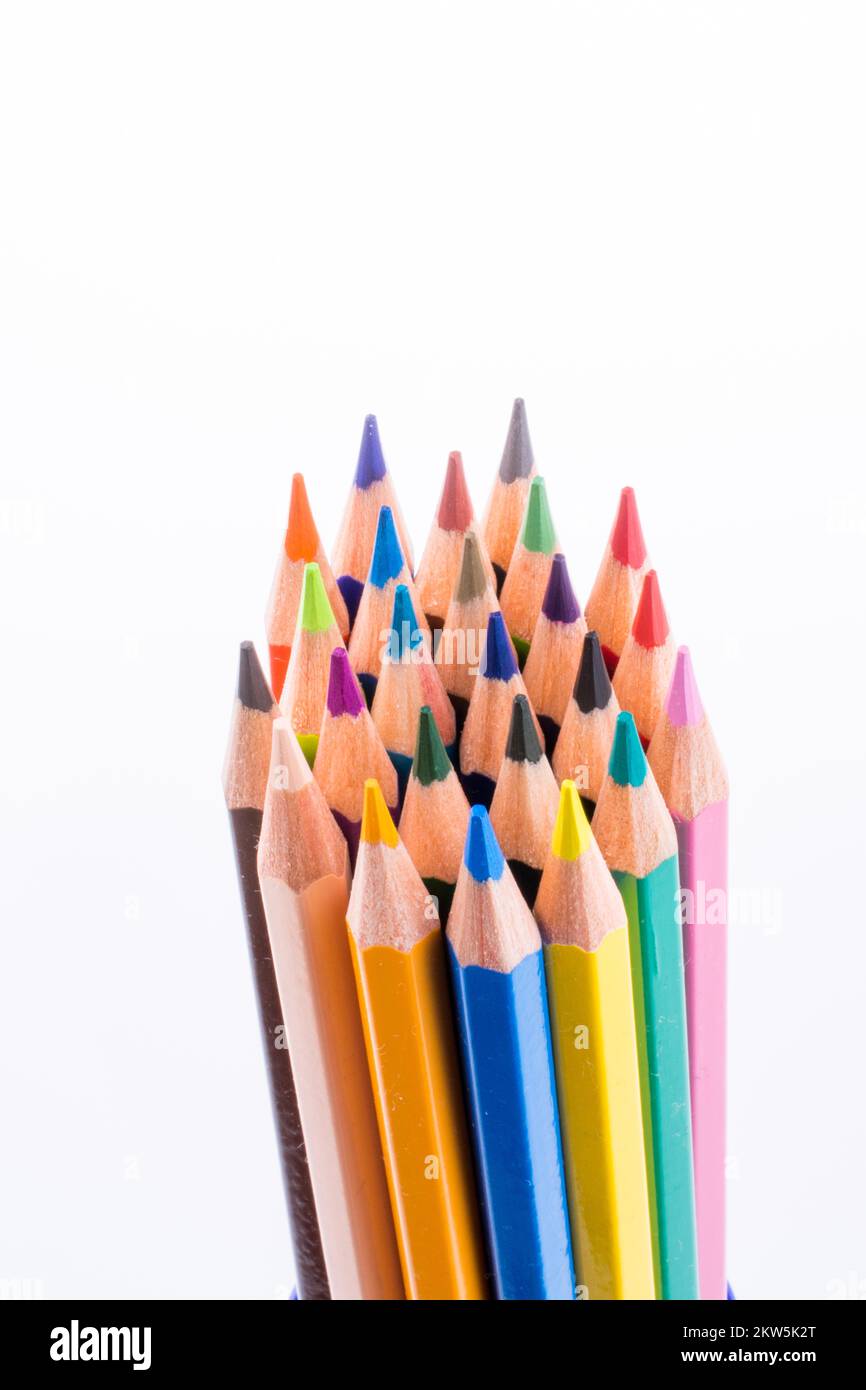 Color pencils of various color on a white background Stock Photo - Alamy